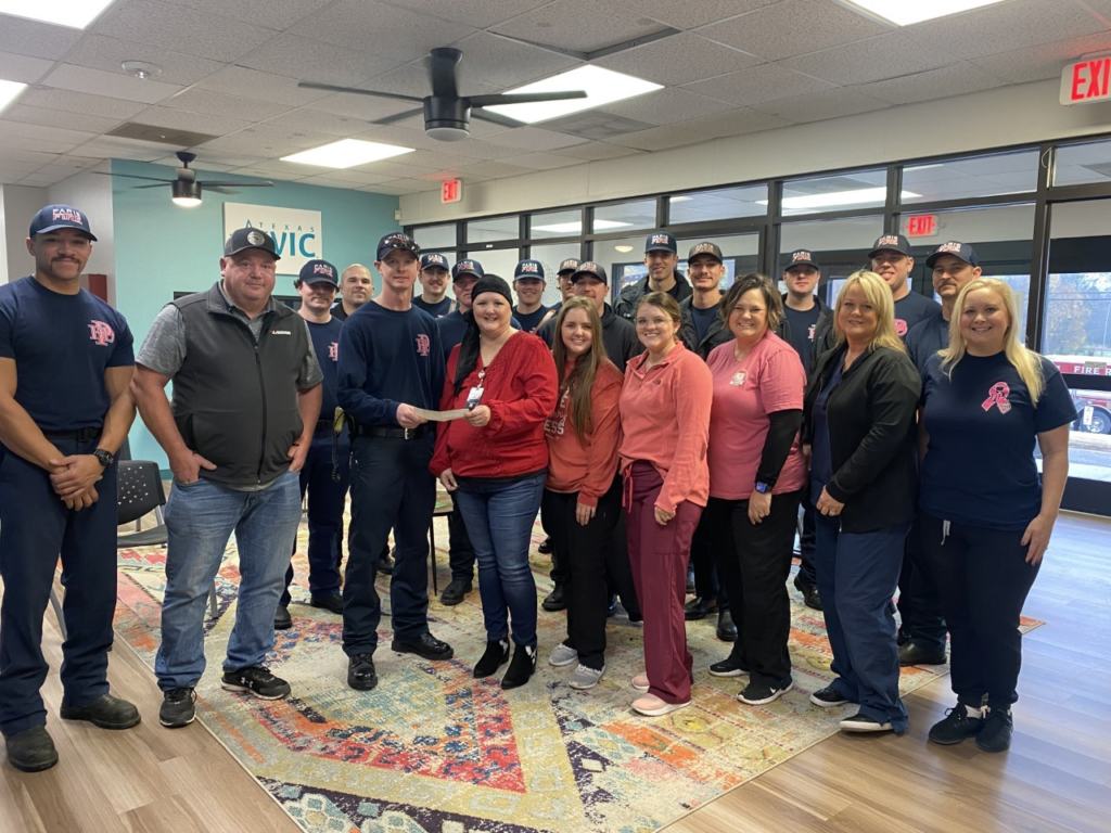 Helm family received Breast Cancer Awareness donation from Paris Fire ...